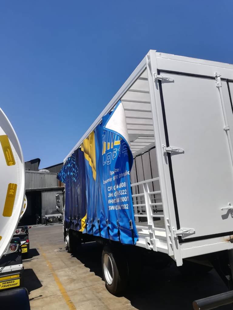 Tarp and Sign – Specializing in truck tarpaulin printing, installation ...