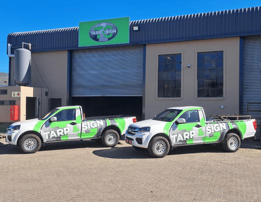 Get in Touch – Tarp and Sign